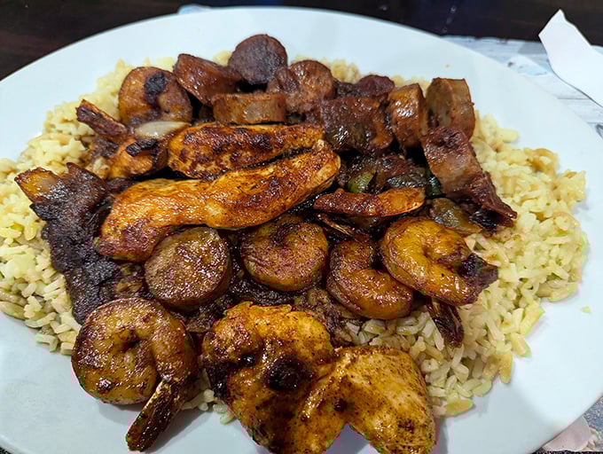 Blackened seafood over rice&mdash;proof that sometimes the simplest presentations let quality ingredients shine. That caramelization is where all the magic happens.