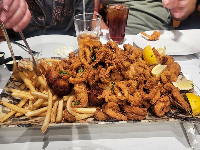 A mountain of golden-fried seafood that could make Neptune himself abandon his trident for a fork&mdash;this is why elastic waistbands were invented.