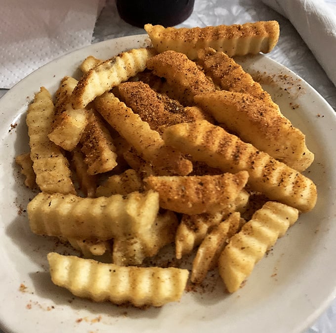 Crinkle-cut fries dusted with seasoning that would make a potato proud. Simple pleasures elevated to art form status.