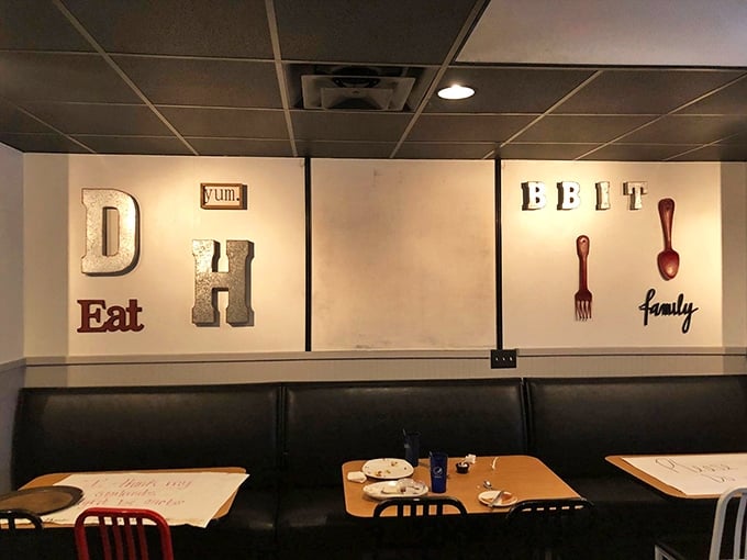 Wall art that spells out exactly what you came to do: eat good food with people you like in a place that feels like a second home.
