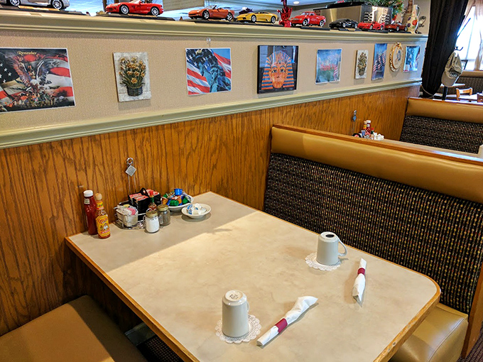 Classic diner aesthetics with wood paneling and booth seating—where every table feels like the best seat in the house.