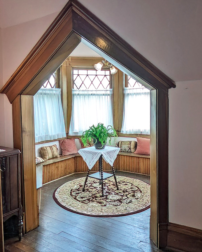 The reading nook that proves Victorians understood cozy corners long before social media made them trendy. This space was made for whispering secrets and devouring novels.