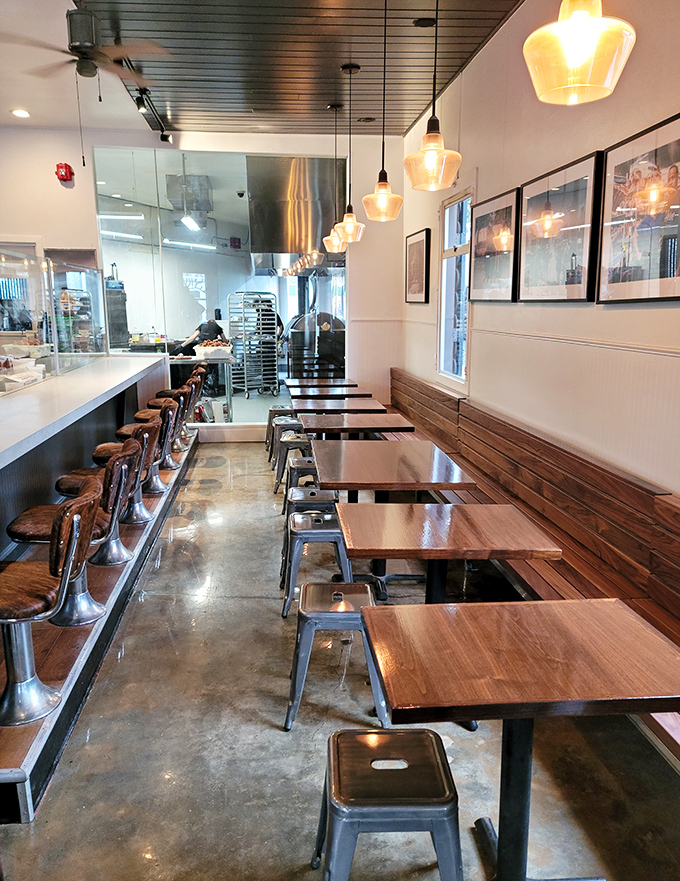Clean lines, wood tones, and pendant lighting create the perfect backdrop for the star of the show&mdash;whatever's coming out of that kitchen.
