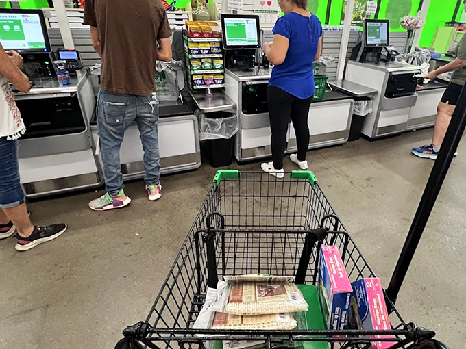 The final frontier: self-checkout lanes where your cart of treasures transforms from potential purchases to proud possessions.
