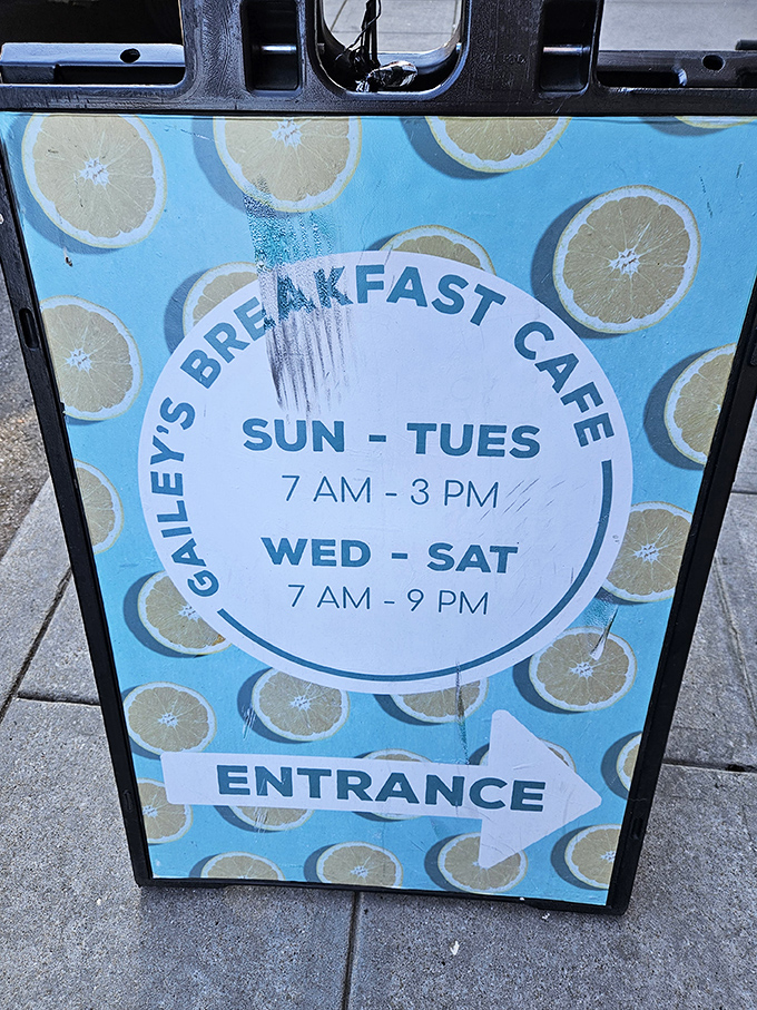 The hours sign that answers life's most important question: "When can I get those pancakes?" The lemon pattern is just showing off.