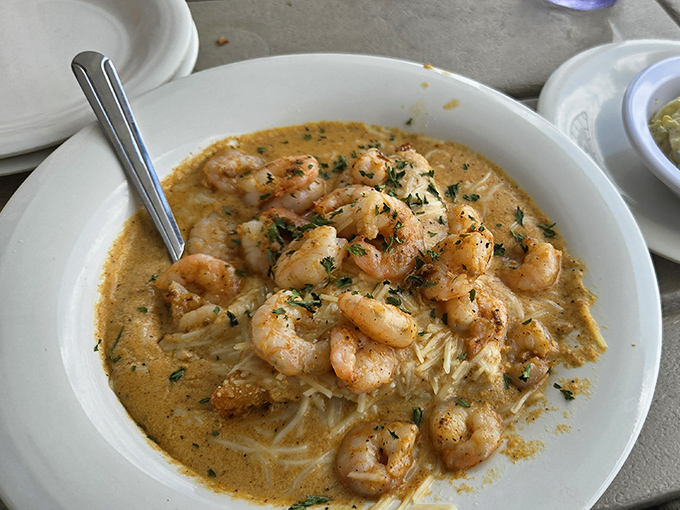 Shrimp and grits swimming in creamy sauce&mdash;a Southern romance story where neither party is playing hard to get.