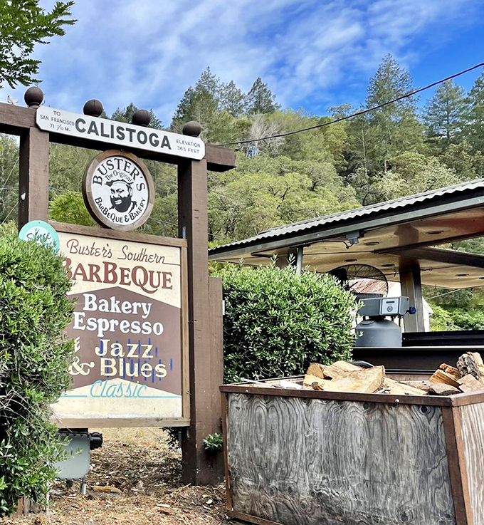 Buster's wooden sign stands as a rustic landmark, pointing hungry travelers toward BBQ salvation in the heart of wine country.