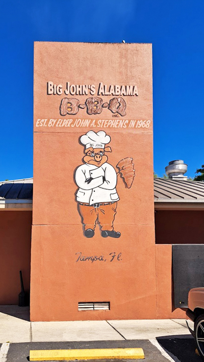 The Big John's sign with its chef pig mascot has become a Tampa landmark. Standing tall and proud since 1968, it's seen generations of BBQ lovers.