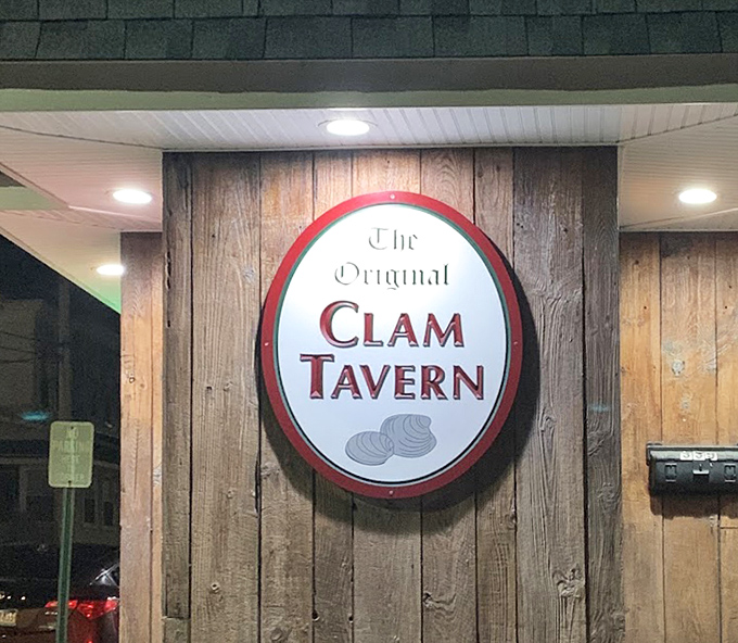 The sign promises clams, and inside, they deliver. Like a maritime welcome mat, it simply states: "Seafood paradise, right this way."