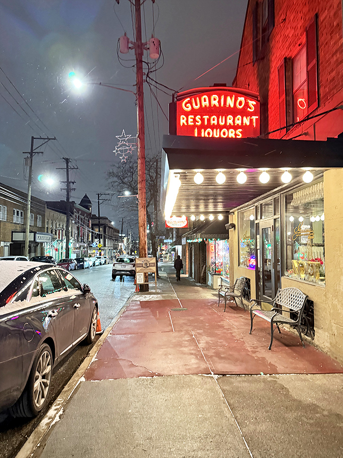 The iconic red neon sign cuts through Cleveland's night like a beacon, guiding hungry travelers to this temple of Italian-American comfort food.