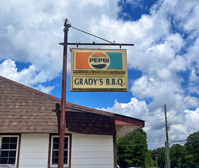 A sign that's witnessed countless satisfied customers over the years, standing proud like a beacon for hungry travelers.