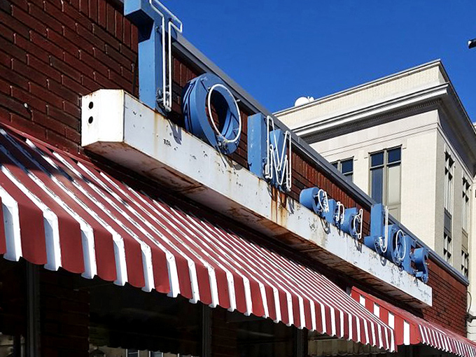 The neon sign glows like a lighthouse for hungry travelers. In a sea of chain restaurants, Tom & Joe's stands as a beacon of individuality.