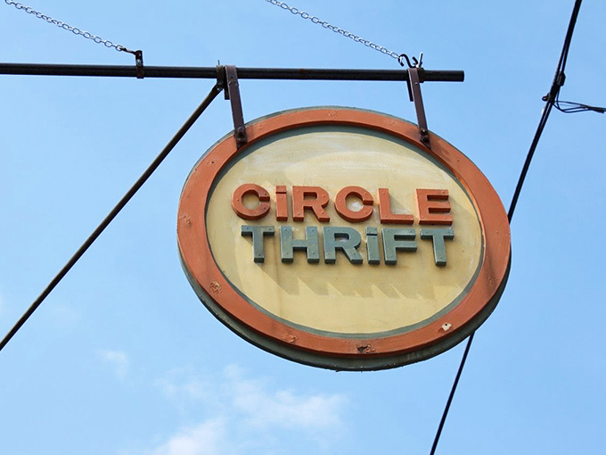 The iconic Circle Thrift sign hanging above the street, a beacon for bargain hunters and vintage enthusiasts alike.