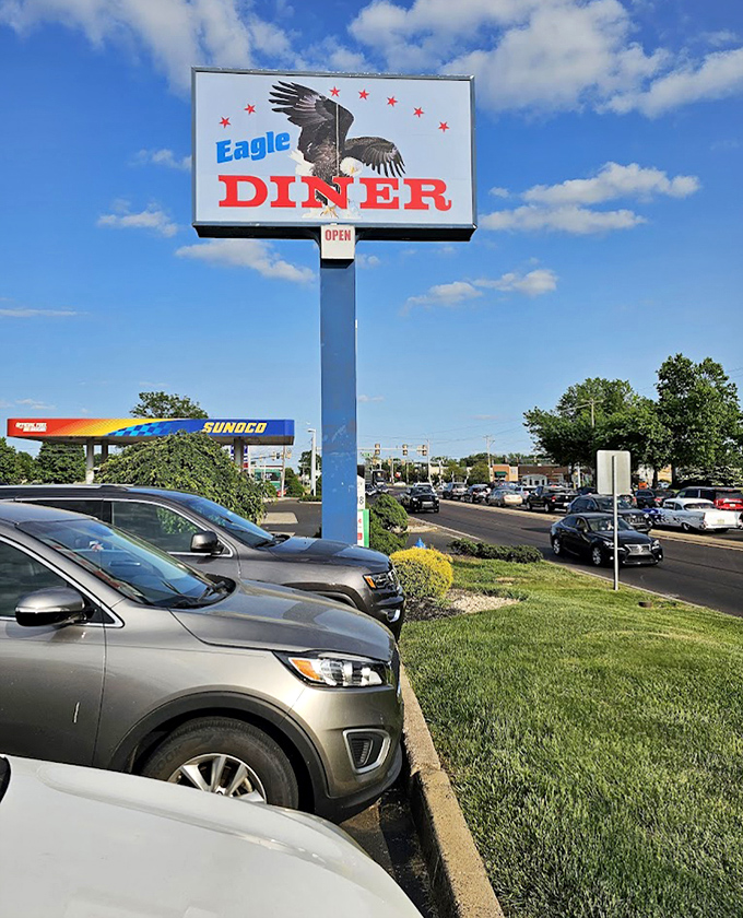 The roadside sign stands tall against Pennsylvania skies, a beacon for hungry travelers. Those red stars promise all-American dining excellence.