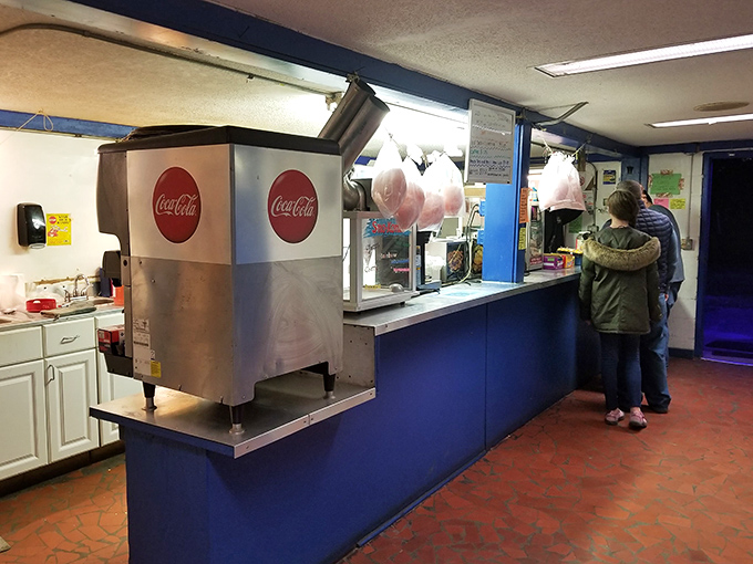 Inside the concession stand, cotton candy and popcorn await while the soda machine stands ready to fuel your double-feature endurance.