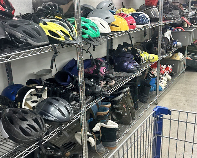 Helmets and sports gear line up like veterans of weekend warriors past, ready to protect the next generation of bikers, skaters, and adventurers.
