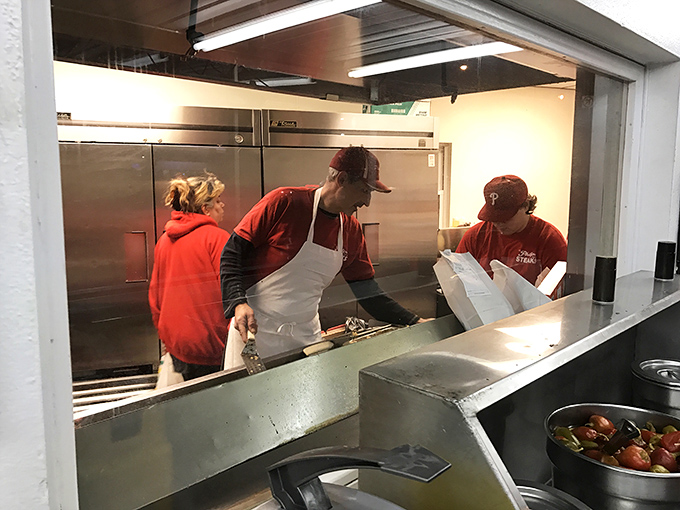 Behind the scenes where the magic happens—dedicated hands turning simple ingredients into legendary Philadelphia experiences.