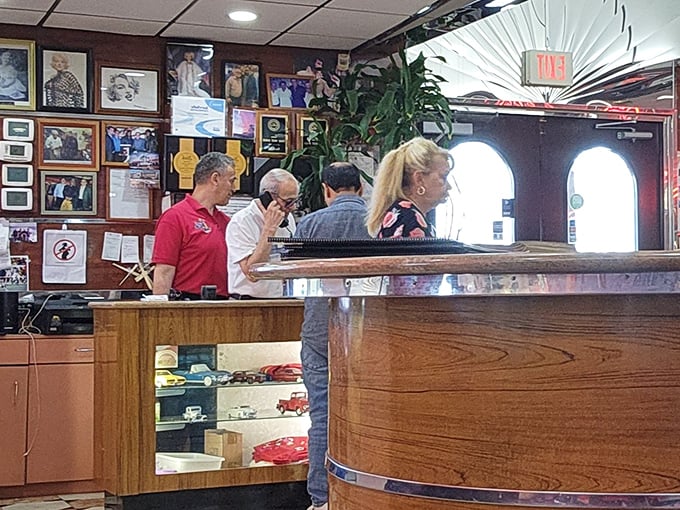Where the magic happens: the front counter area, complete with wall of fame photos documenting decades of satisfied customers.