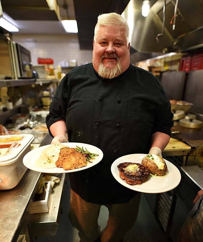 In the kitchen, culinary tradition meets genuine pride as plates of heartland classics await their journey to eager tables.