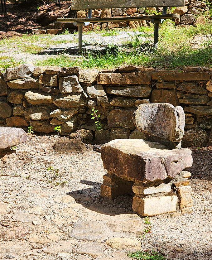 This rustic stone bench invites weary explorers to sit a spell and soak in the peaceful surroundings of Campbell's Covered Bridge Park.
