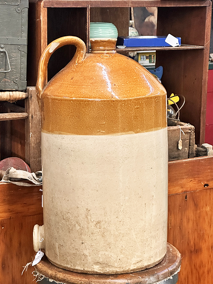 Two-toned stoneware that once held everything from moonshine to molasses now stands ready for a second life as a statement piece.