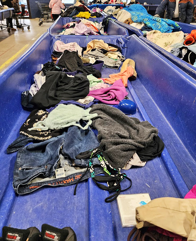 Textile treasures awaiting discovery. That perfect pair of vintage jeans is hiding somewhere in this blue sea of fabric possibilities.