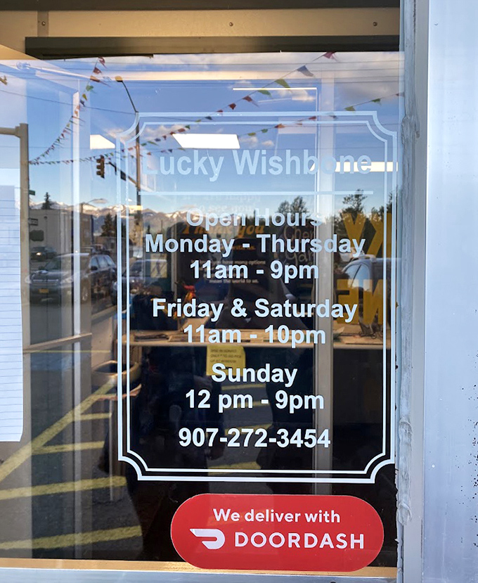 Hours posted clearly&mdash;because when you need fried chicken, you need to know exactly when you can get it. DoorDash for those blizzard days.