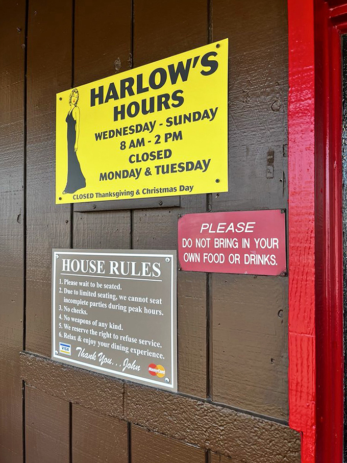 House rules and hours posted with no-nonsense clarity – the sign of a place confident enough in its food to close whenever it darn well pleases.