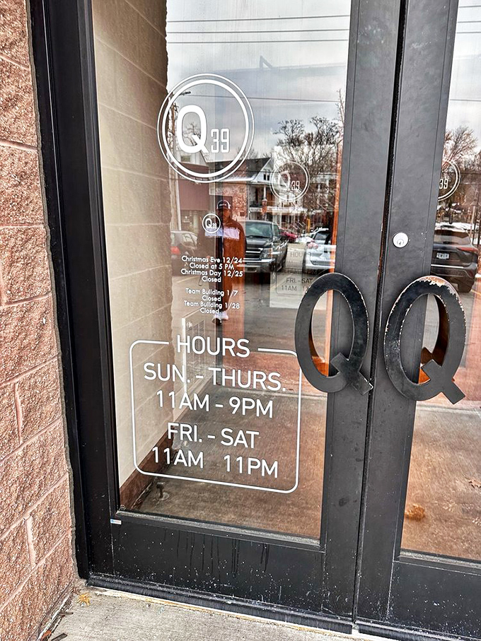 The door handles shaped like Q's are your first hint that attention to detail extends from the restaurant's logo to every aspect of your meal.