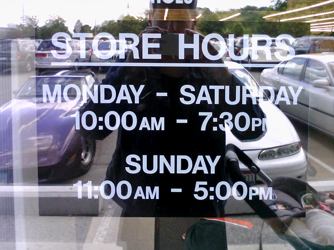 Store hours posted clearly&mdash;the golden schedule for treasure hunters planning their next expedition into the land of secondhand gold.