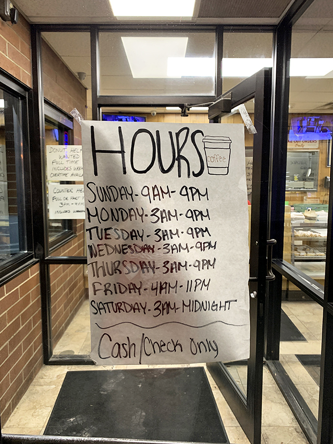 The handwritten hours sign tells you everything you need to know about Biagio's priorities: making great food, not fancy signage. Cash or check only&mdash;just like grandma's birthday cards.