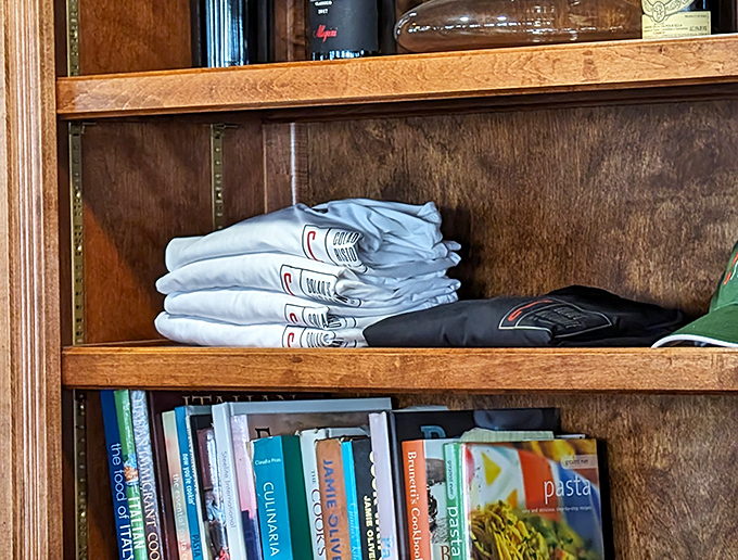 Even the bookshelves speak of passion &ndash; cookbooks and neatly folded shirts suggest this isn't just a restaurant, but a lifestyle.