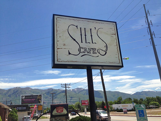 The sign stands like a beacon against Utah's blue sky, promising salvation from hunger and mediocre breakfasts in equal measure.