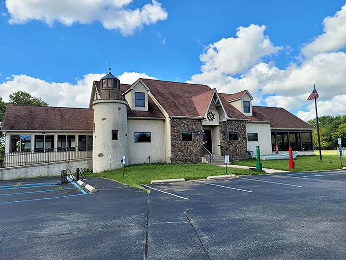 Under blue skies, the lighthouse-inspired turret and stone facade stand as a beacon for seafood lovers throughout Delaware.
