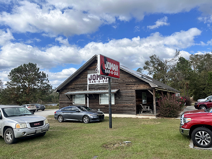 The log cabin exterior says "we've been here a while." The full parking lot whispers "and we'll be here long after trendy food fads fade away."