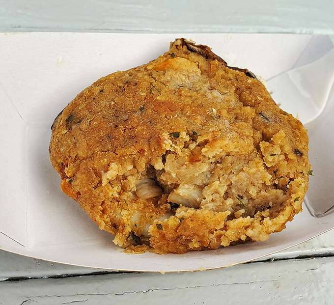 The humble-looking stuffed clam that delivers an explosion of seasoned goodness &ndash; proof that appearances can be deliciously deceiving.