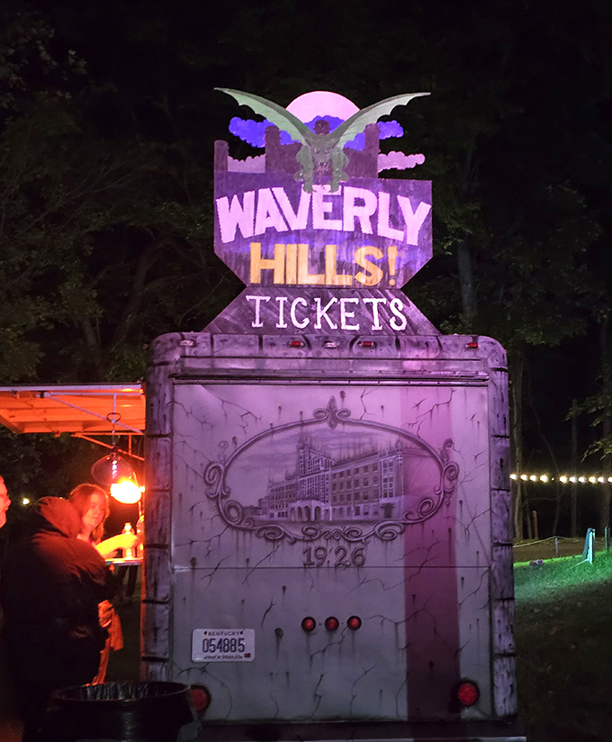 Step right up for a spine-tingling evening! The ticket booth glows with eerie purple light, welcoming brave souls to Waverly's nighttime tours.