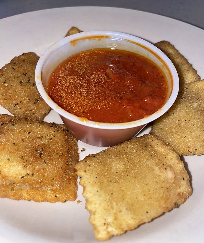 Toasted ravioli: the appetizer equivalent of a warm hug, with marinara sauce standing by for moral support.