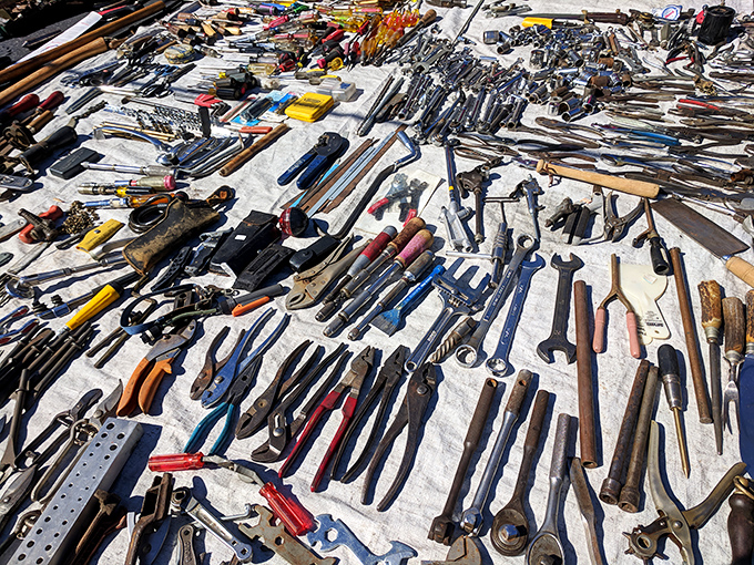 Tools with the patina of a thousand projects&mdash;each wrench and hammer telling stories of garages, workshops, and "I can fix that" declarations.