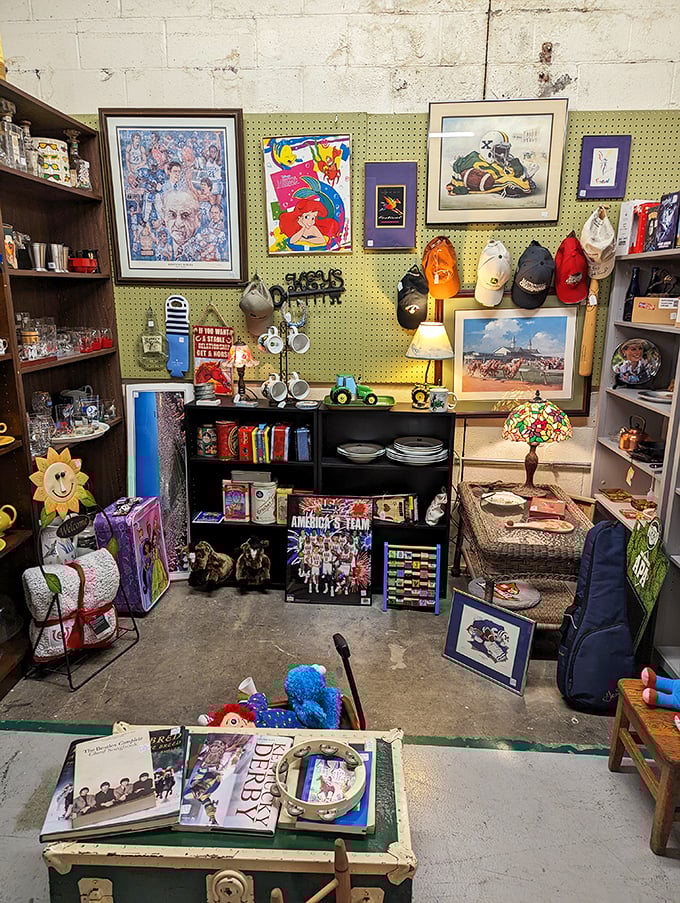 A sports memorabilia corner where Kentucky pride meets childhood nostalgia. Those vintage caps have witnessed countless victories and heartbreaks.
