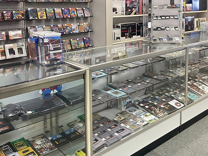 Gaming nostalgia behind glass &ndash; where modern shoppers can reminisce about pixelated adventures while scoring deals on contemporary entertainment.