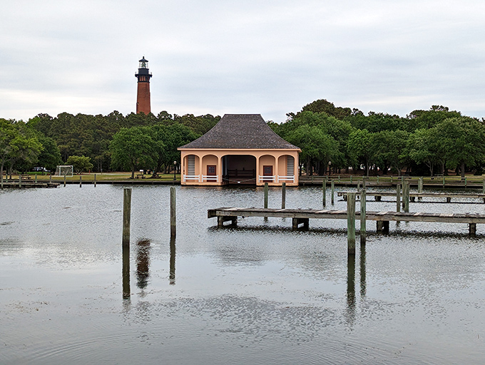 The lighthouse stands sentinel against moody skies, a reminder that these beacons were built to withstand nature's most dramatic moments.
