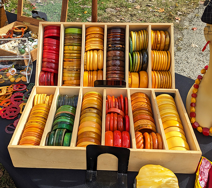 A kaleidoscope of Bakelite bangles arranged with collector's precision – wearable art in a rainbow of colors that brightens any wrist.