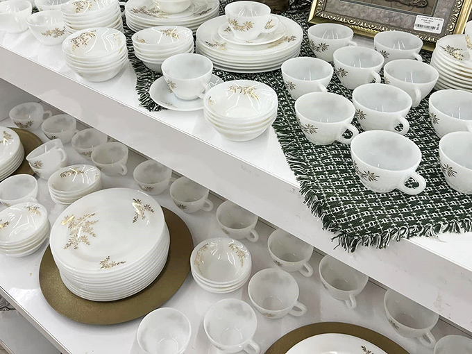 Vintage dishware sets that could star in their own period drama. These milk-glass beauties have hosted more family dinners than you've had hot meals.