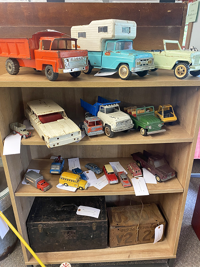 Vintage toy trucks that survived countless childhood adventures now ready to decorate sophisticated adult shelves with nostalgia.