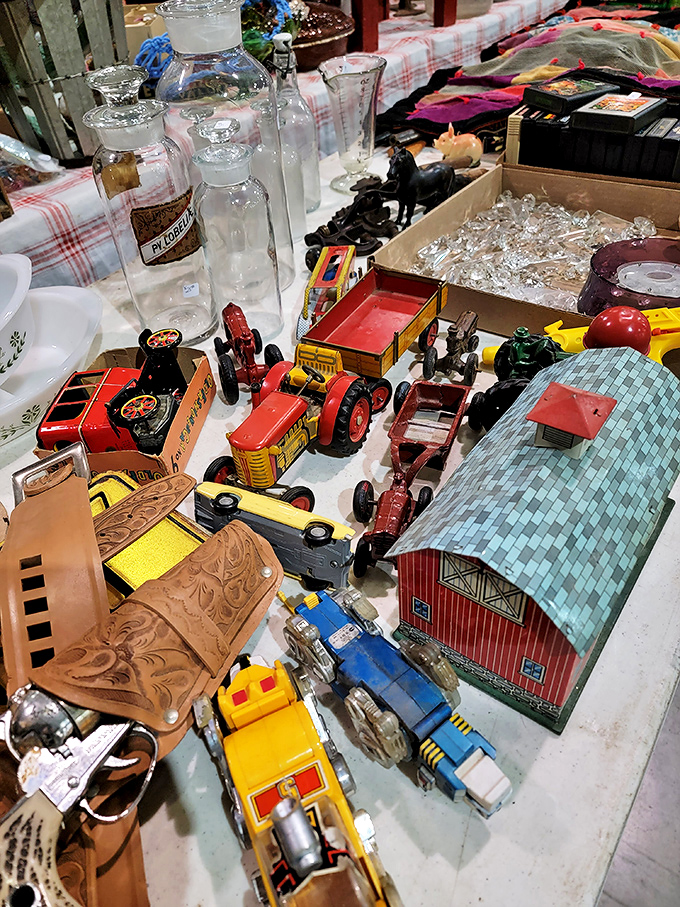 Miniature tractors and tin barns—childhood dreams preserved in metal and paint, waiting for collectors or the young at heart.