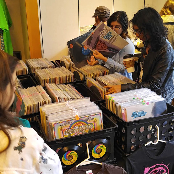 Vinyl hunters flip through records with the focused intensity of archaeologists, searching for that rare album that will complete their collection.