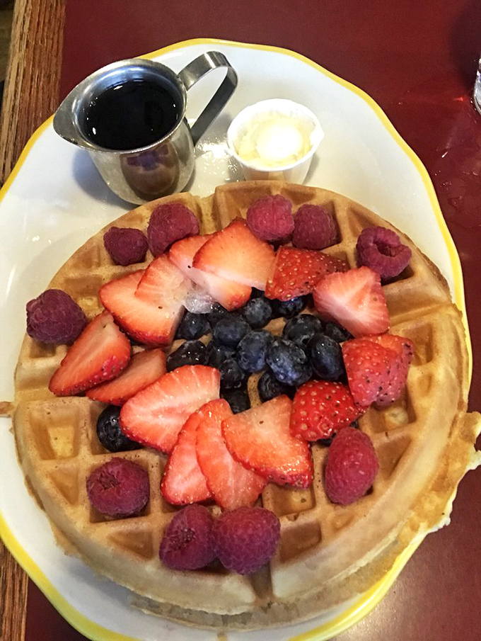This waffle doesn't need Instagram filters &ndash; its fresh berry topping and golden grid create a naturally photogenic breakfast masterpiece.