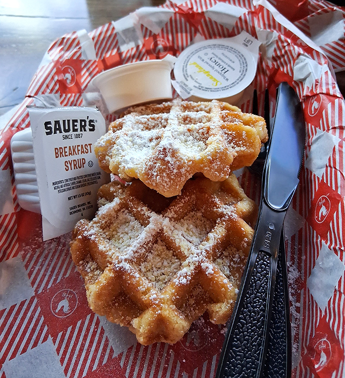These aren't just waffles&mdash;they're golden, crispy life rafts in a sea of spice, dusted with powdered sugar and ready for their maple baptism.