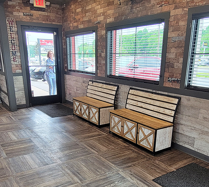 The waiting area's rustic benches suggest patience will be rewarded&mdash;good things come to those who wait for properly smoked meat.